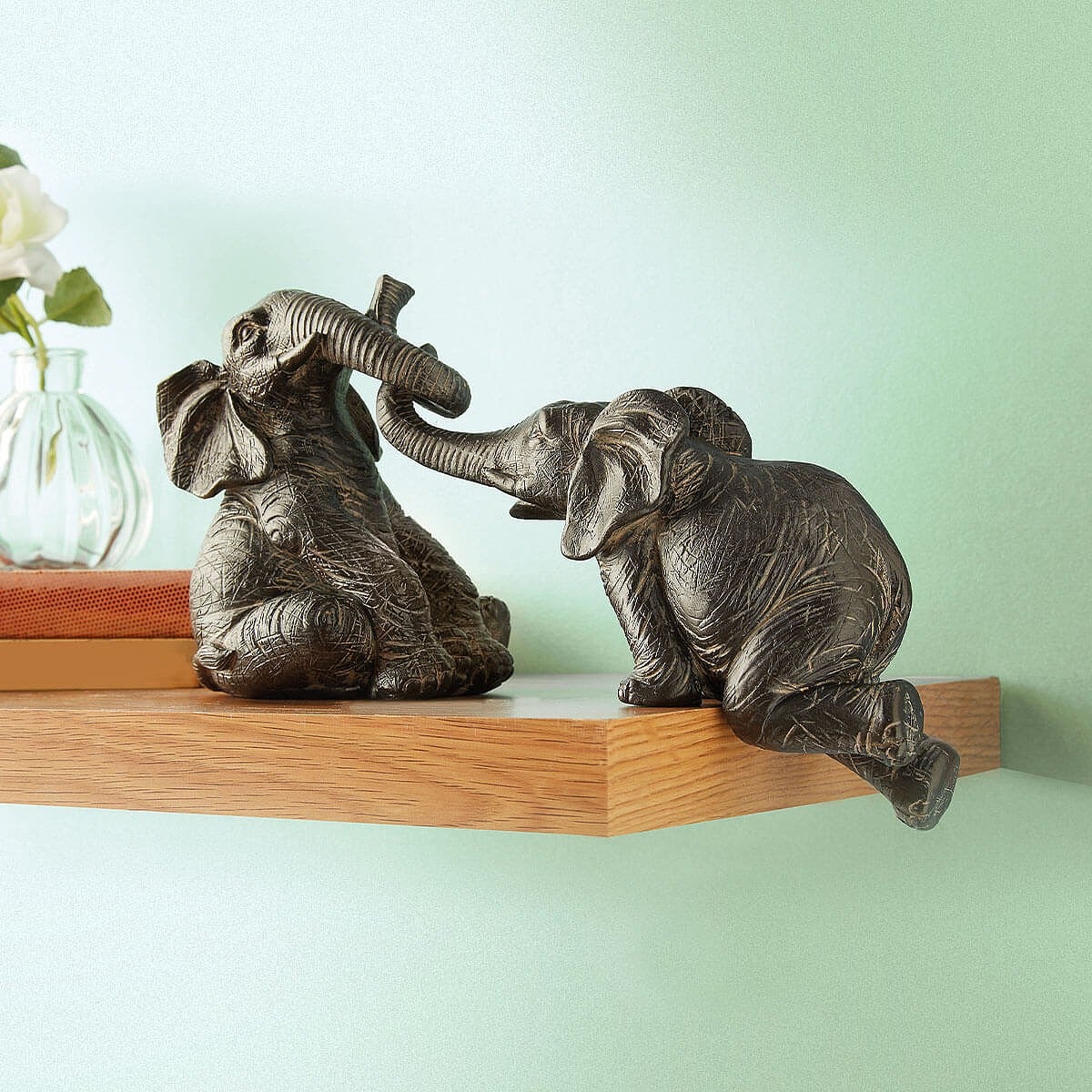 Set of 2 Shelf Elephants. Handmade with bronze highlights.