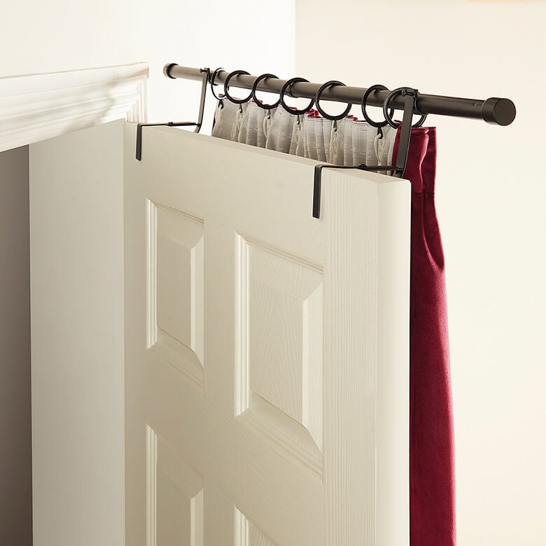 Magnetic curtain rod for door store